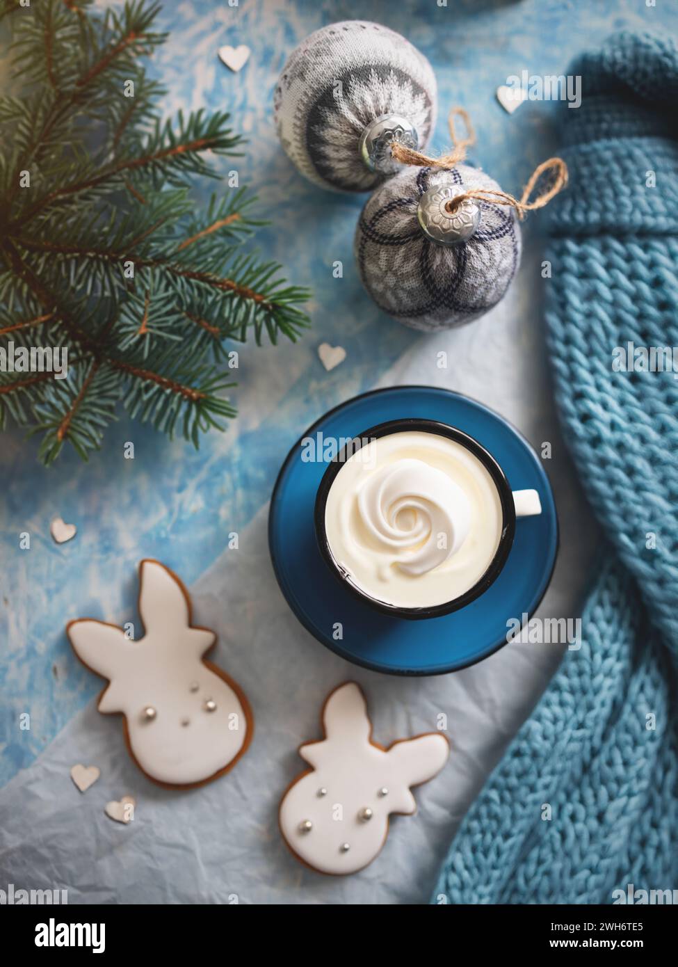 Enameled cup with whipped cream on a rustic background with beautiful ...
