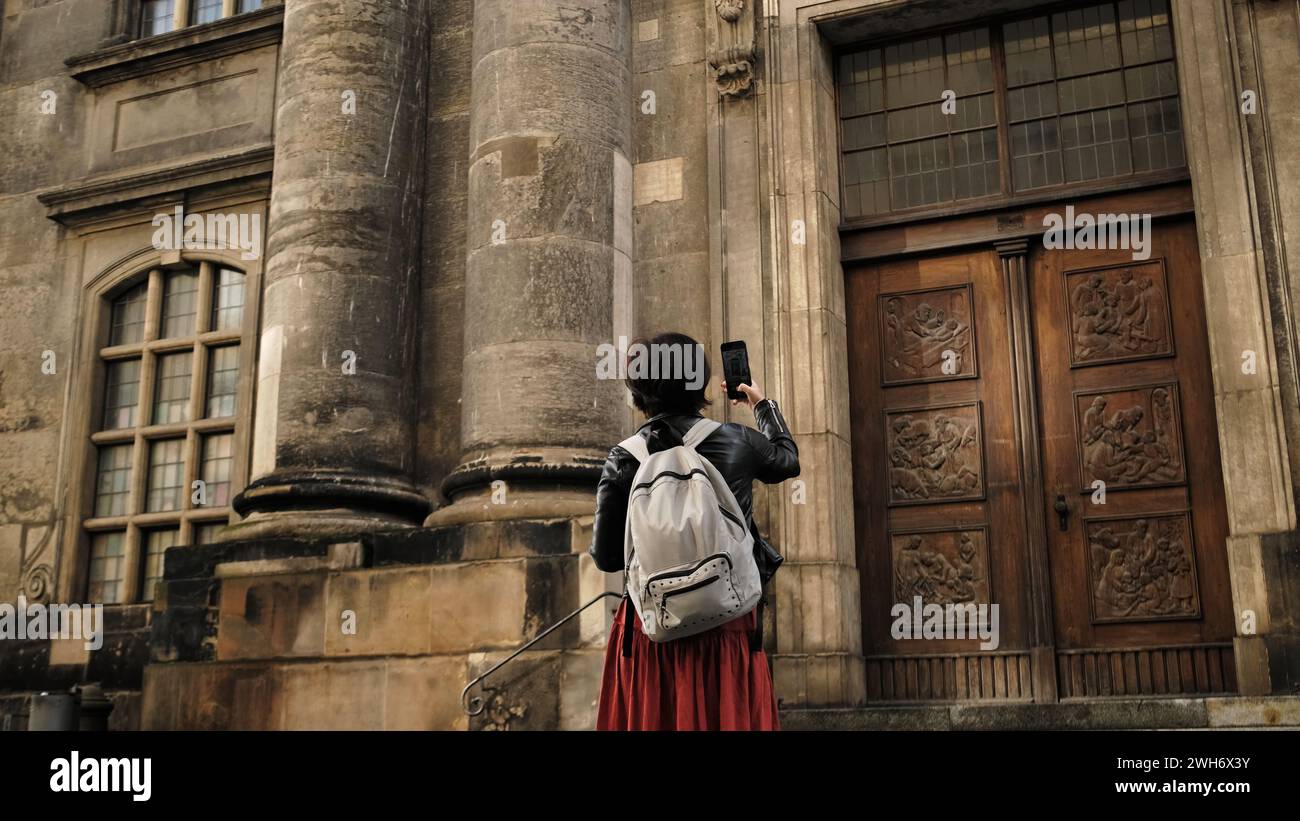 Attractive Female Tourist Walks With Germany Flag In Dresden'S ...