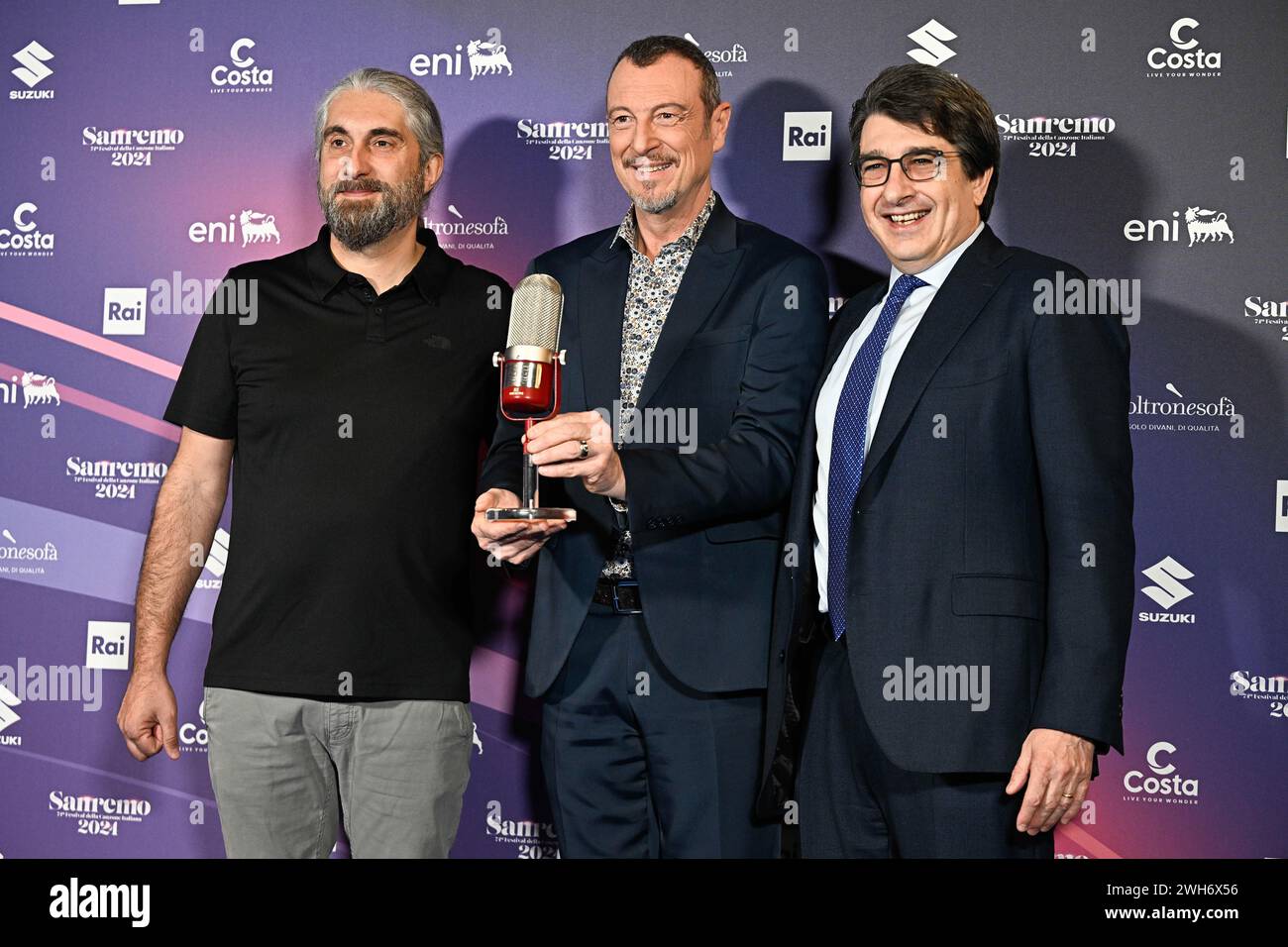 Amadeus receives the Asso Musica award from Carlo Parodi and Fulvio De ...