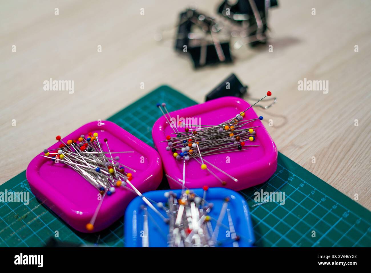Colorful pins in the sewing studio Stock Photo - Alamy