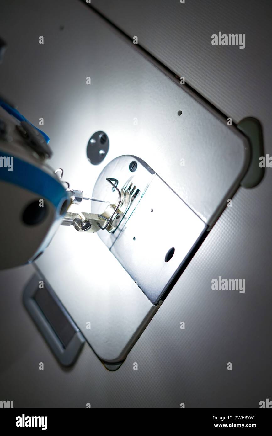 Working in the sewing studio. Sewing machine Stock Photo - Alamy