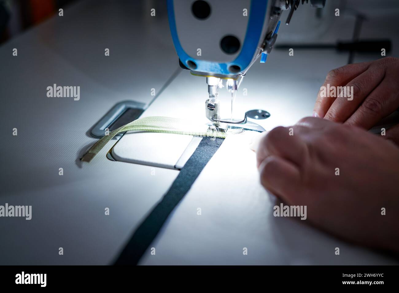 Working in the sewing studio. Sewing machine Stock Photo - Alamy