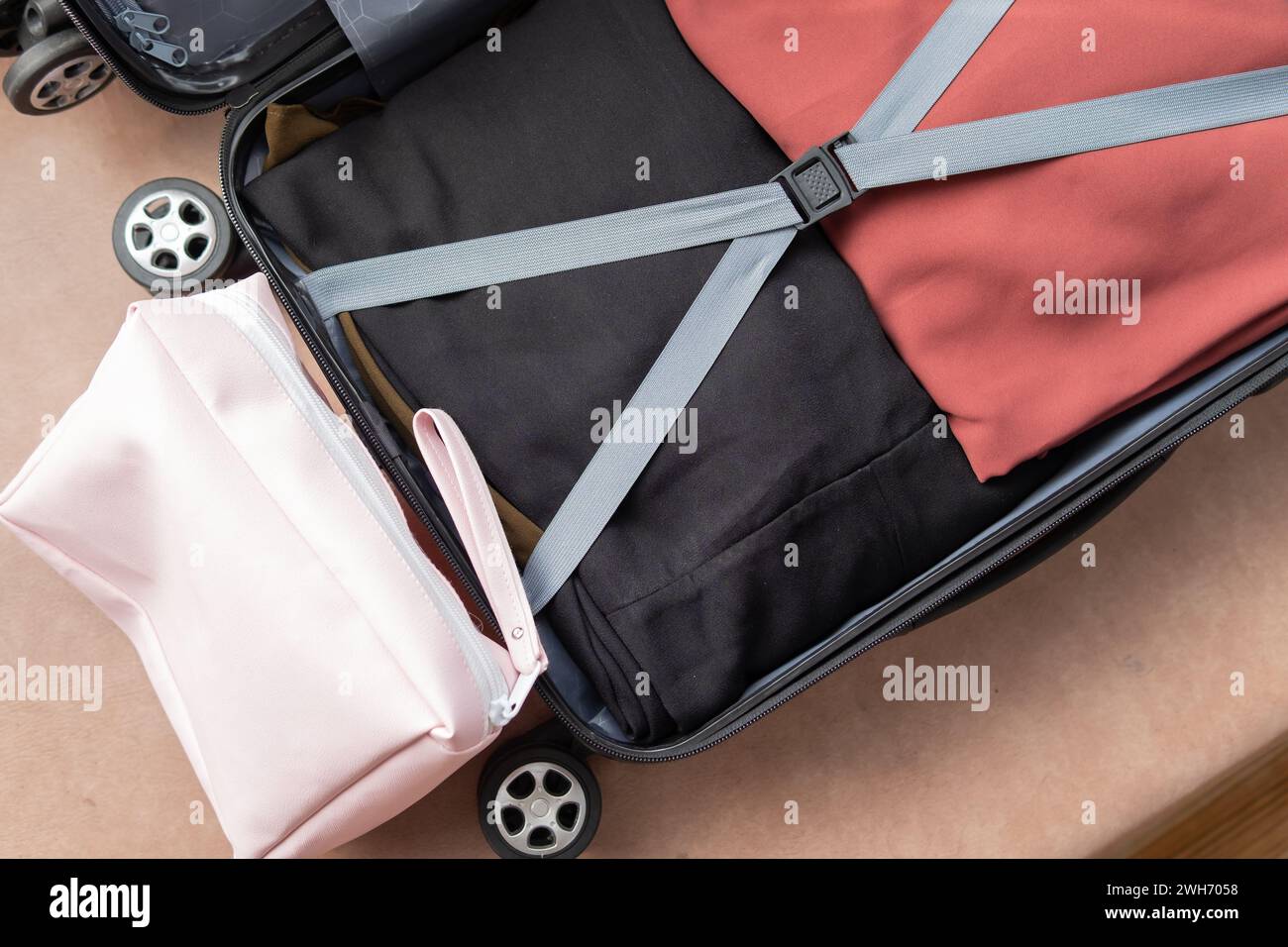 Packed open suitcase hi-res stock photography and images - Alamy
