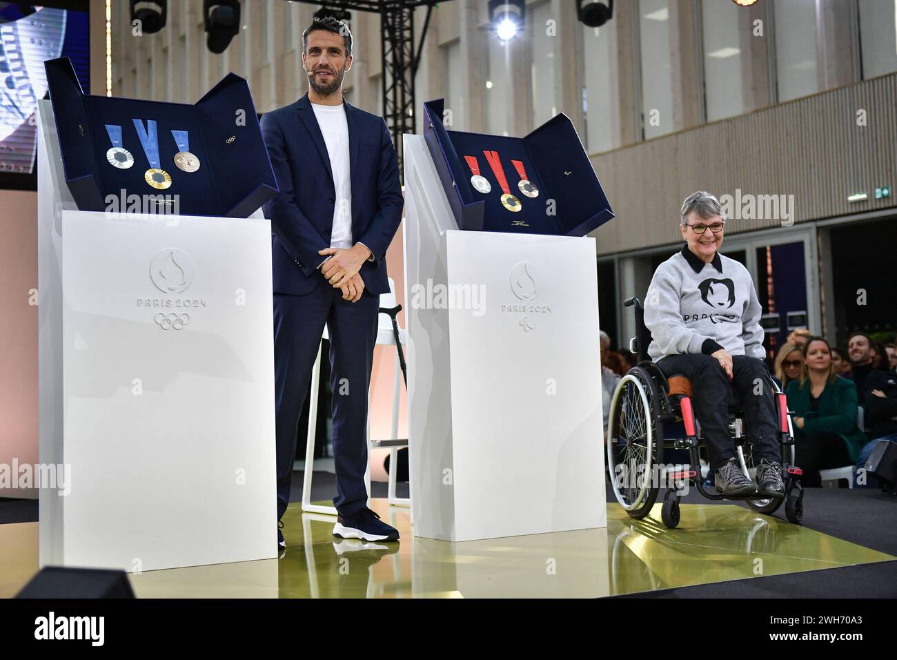 President of Paris 2024, Tony Estanguet (L) and French Paralympic ...