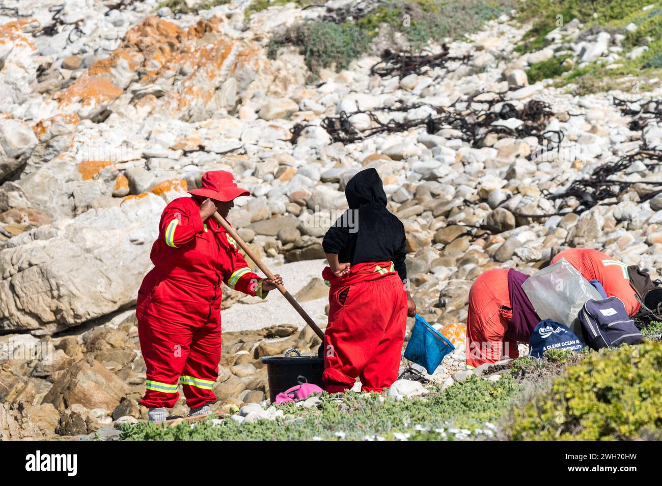 group of people or municipal workers in work overalls close up during ...