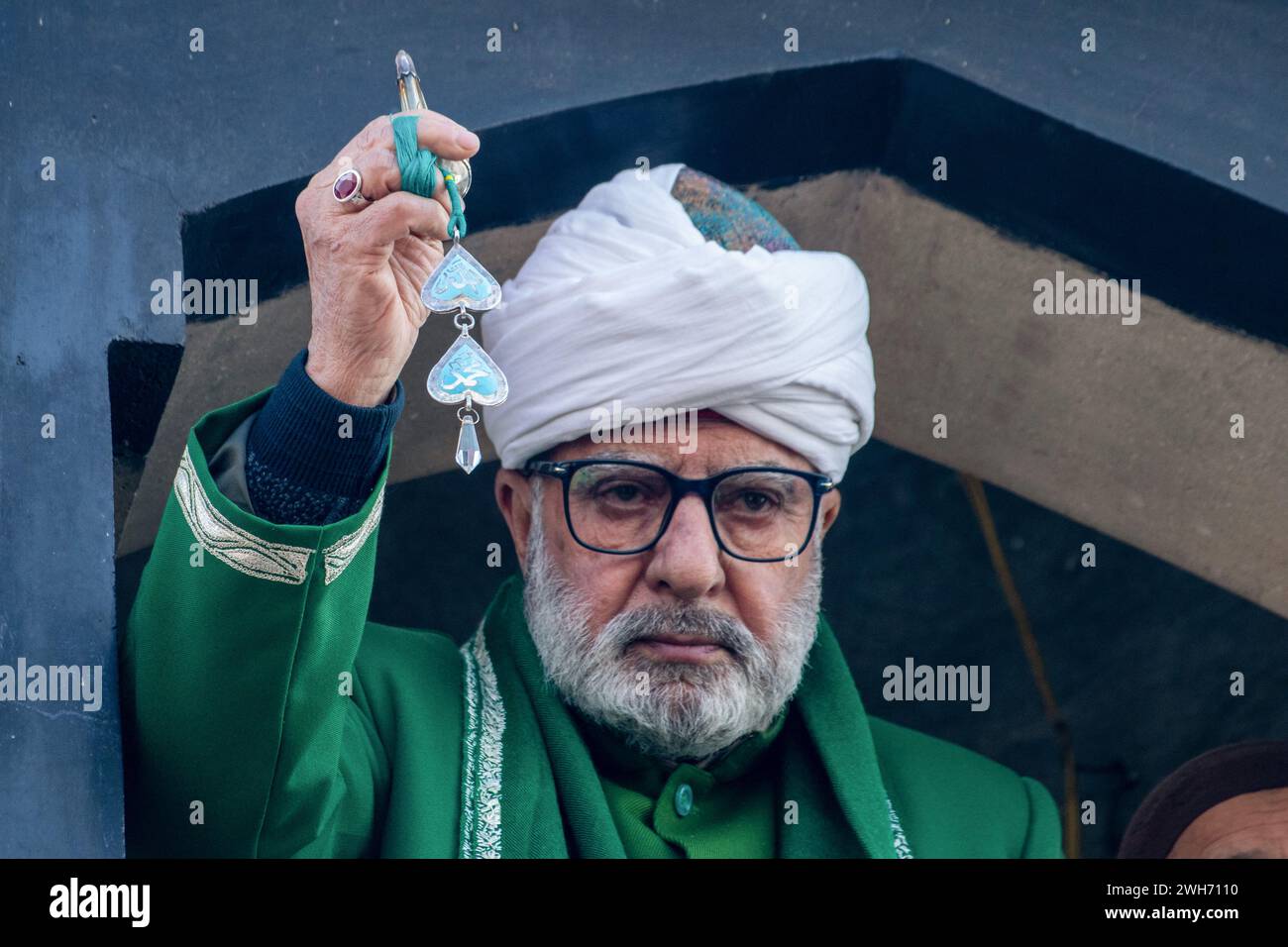 Srinagar, India. 08th Feb, 2024. Muslim head cleric displays the holy ...