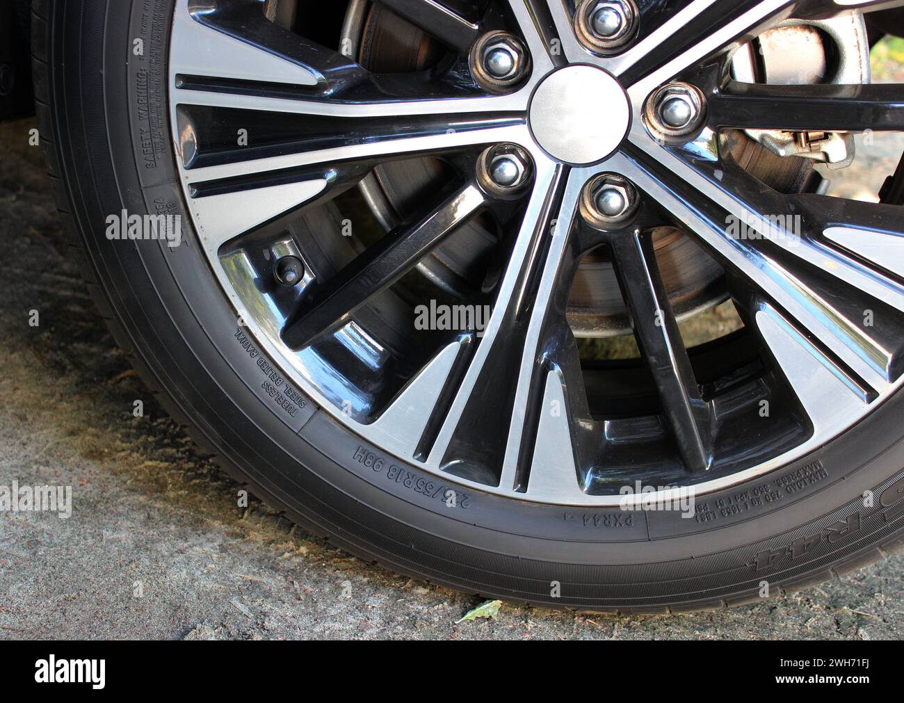Detailed View Of Brake Disk And Black Wheel Rim Of A Car On A Ground ...