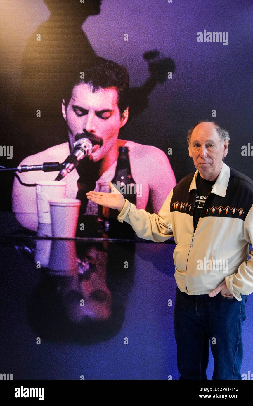 Photographer Peter Hince poses in front of one of his picture during ...