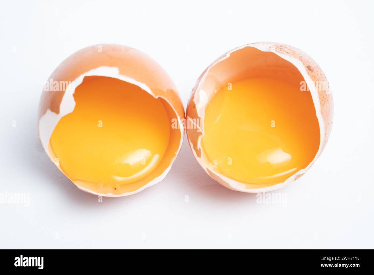 Uncooked egg yolk isolated above hi-res stock photography and images ...