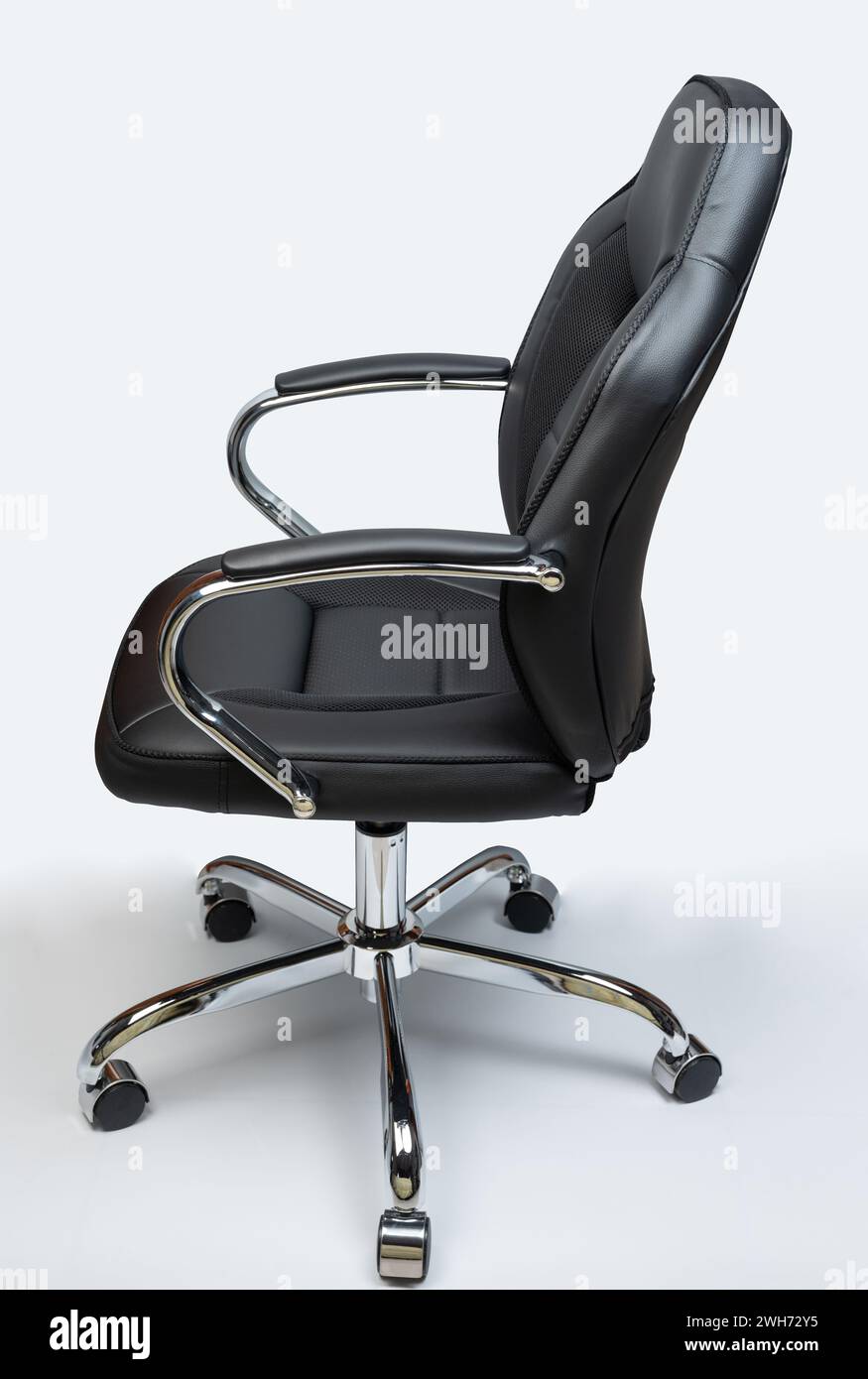 New leather office chair with arm support side view isolated on white ...