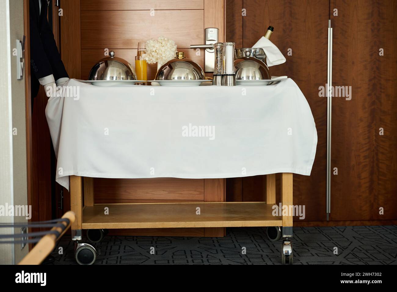 Waiter serving trolley hi-res stock photography and images - Alamy
