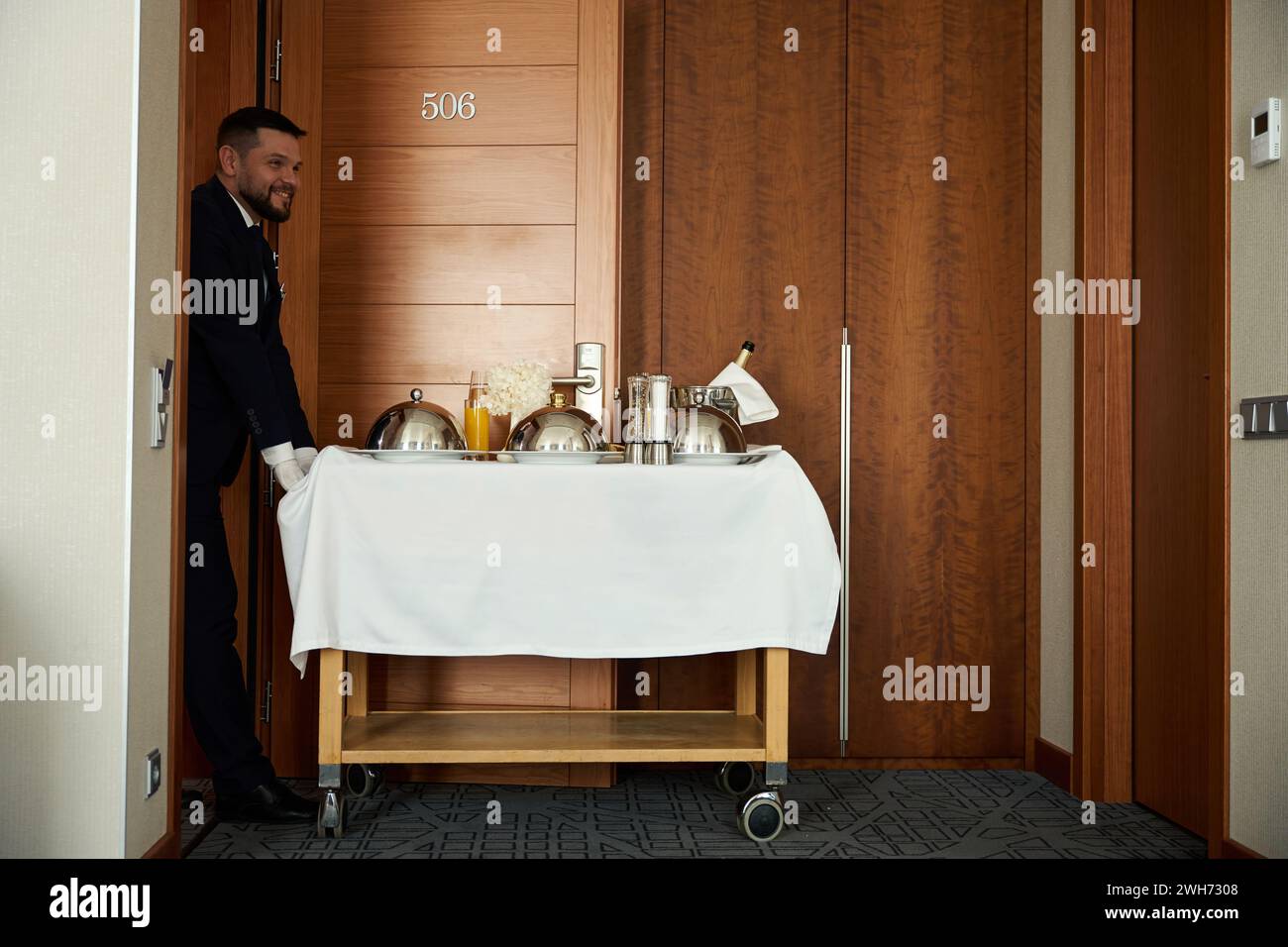 Waiter serving trolley hi-res stock photography and images - Alamy
