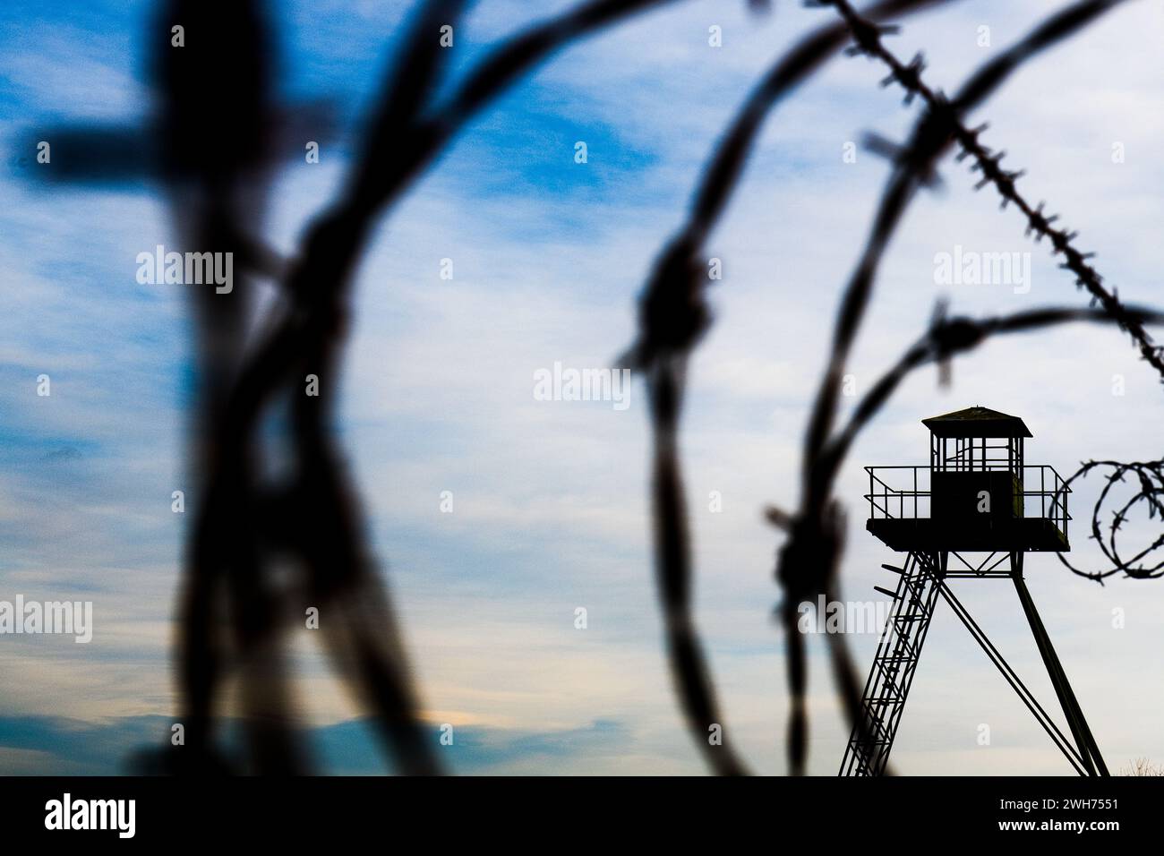 An original example of the impassable state border with barbed wire ...