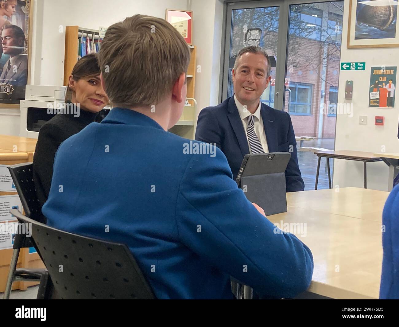 Stormont Education Minister Paul Givan speaks to staff and students at Rathmore Grammar School ...