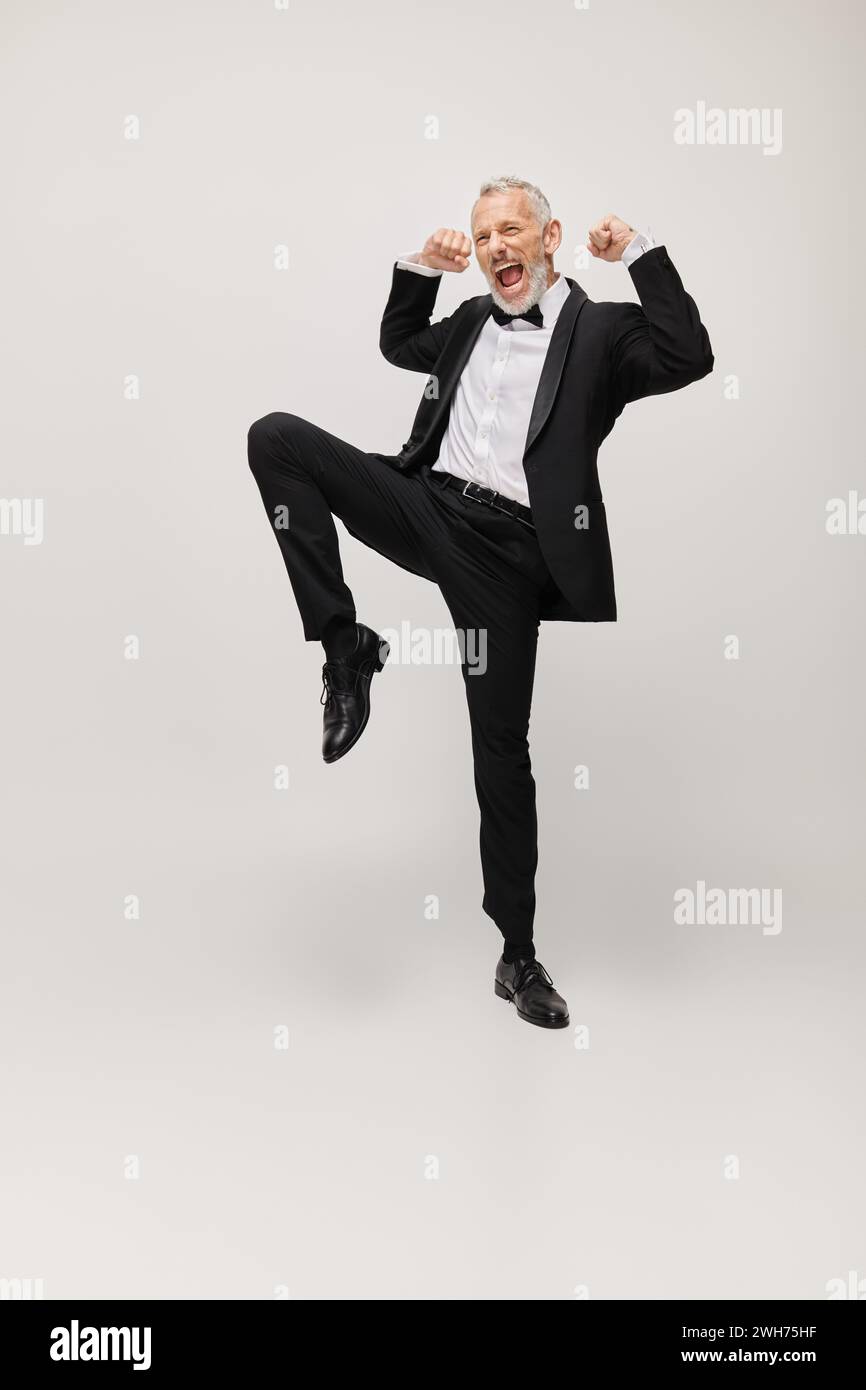 Sleek gray suit hi-res stock photography and images - Alamy