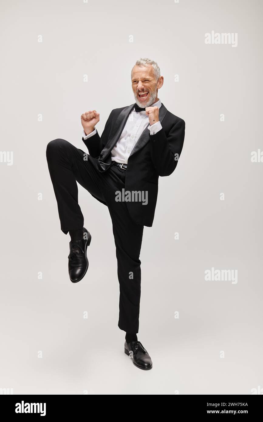 Sleek gray suit hi-res stock photography and images - Alamy