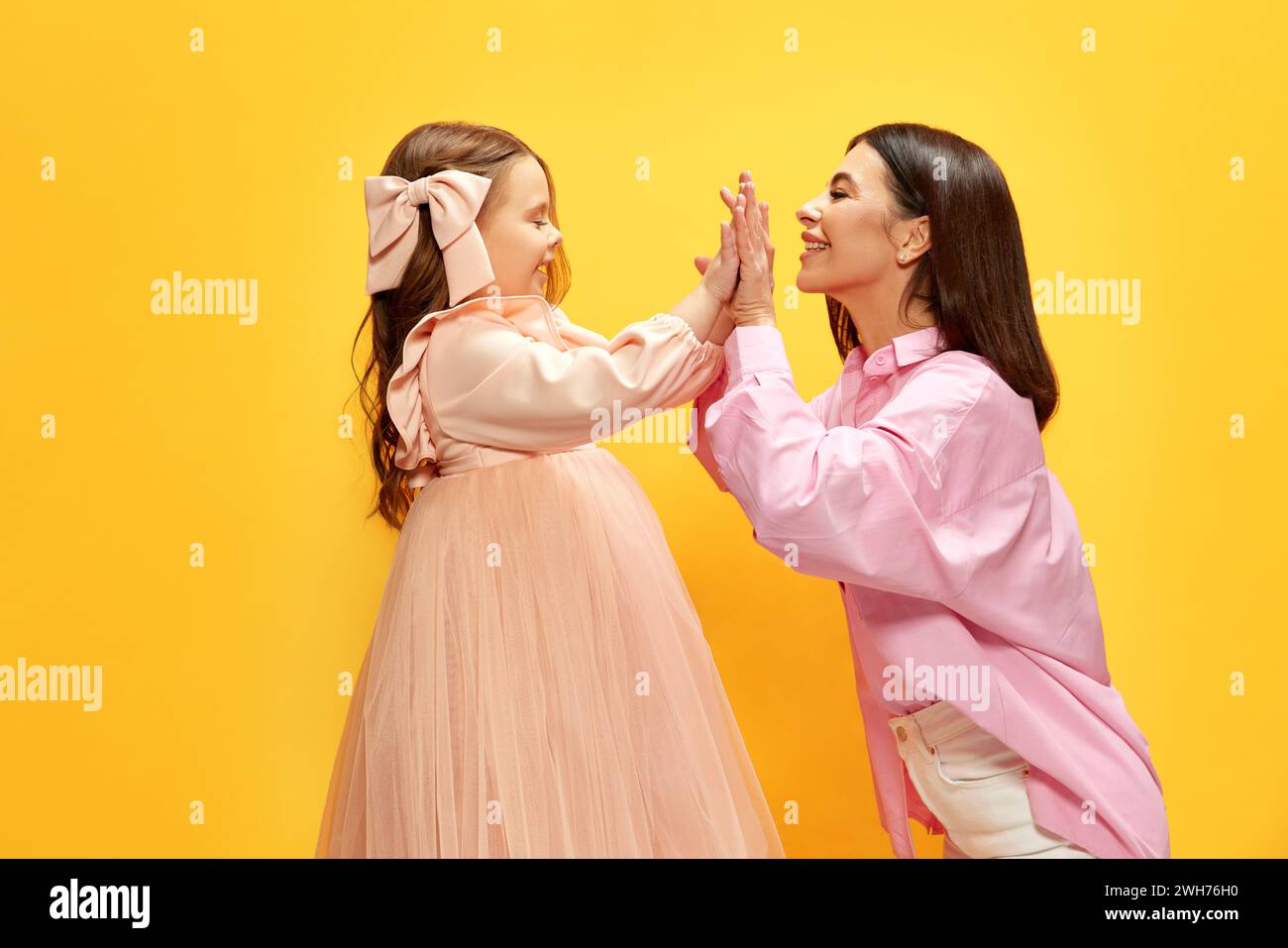Mother's support and care. Happy family, mother and daughter holding ...