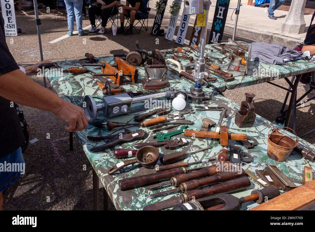 Hand reaches tools in hi-res stock photography and images - Alamy