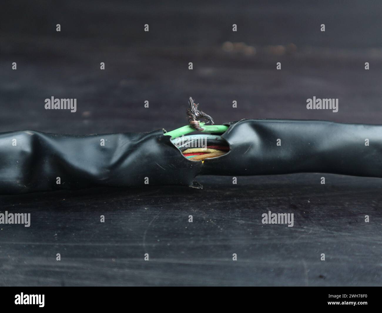 simple winding of an automotive cable connection that is experiencing ...