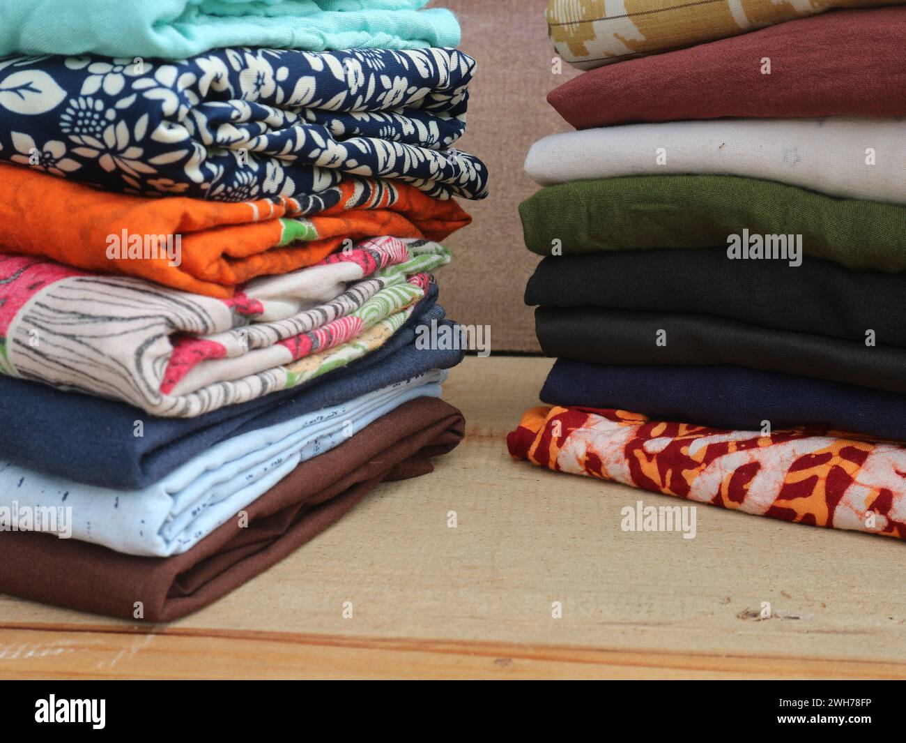 Folded cloth in piles hi-res stock photography and images - Alamy