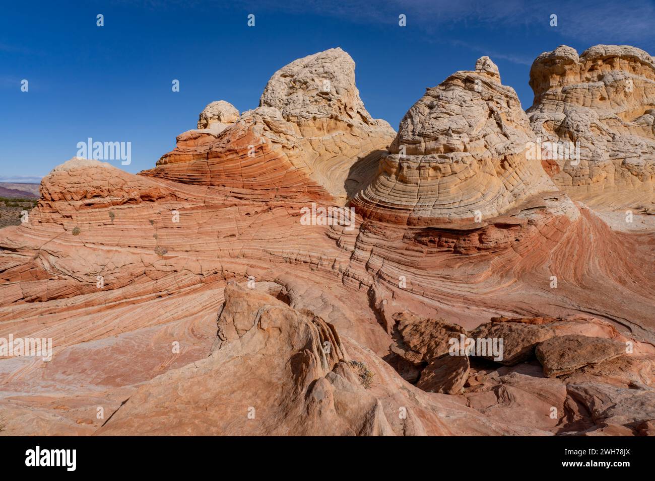 A teepee-shaped sandstone rock formation in the White Pocket Recreation ...