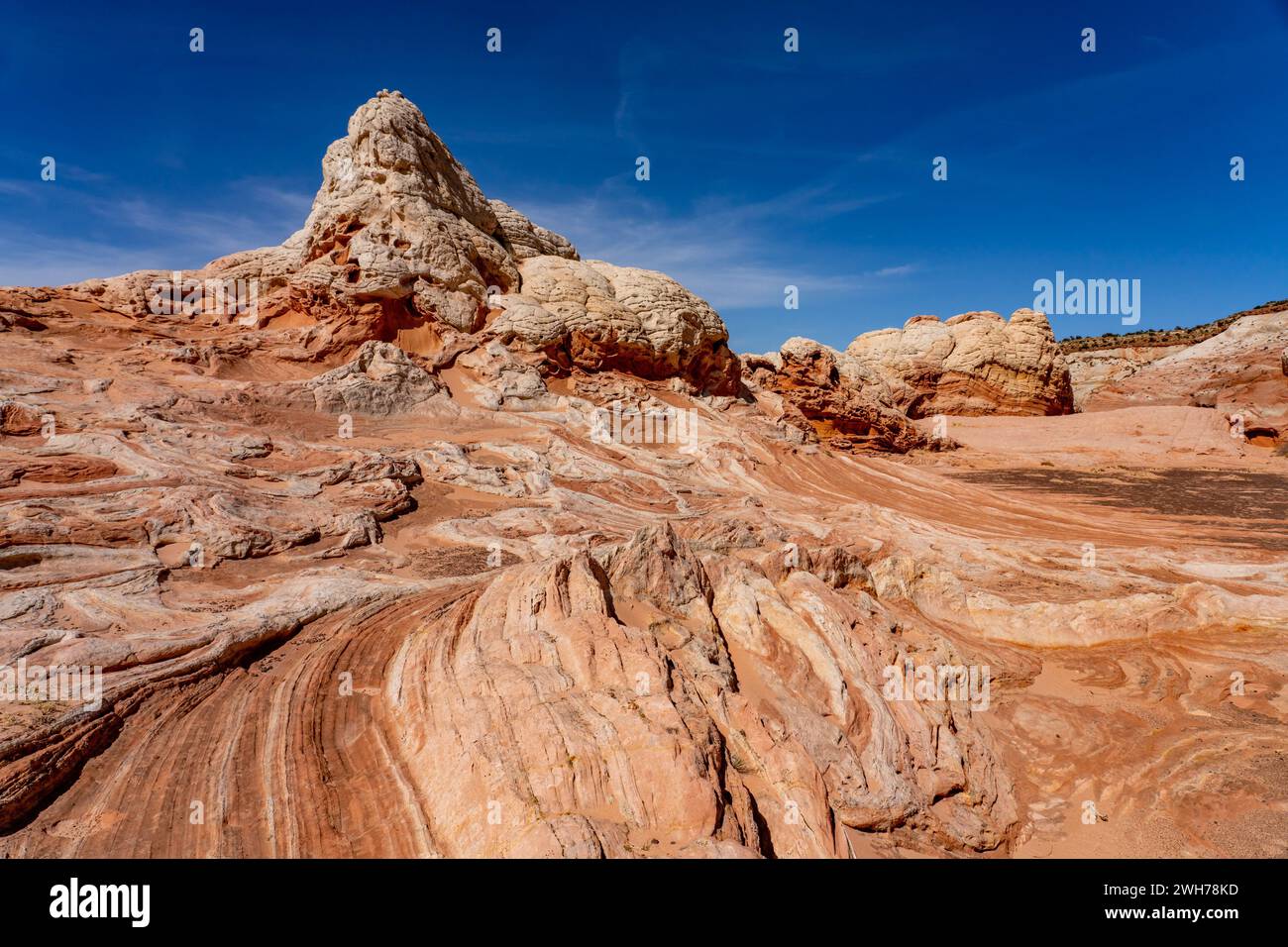 A teepee-shaped sandstone rock formation in the White Pocket Recreation ...