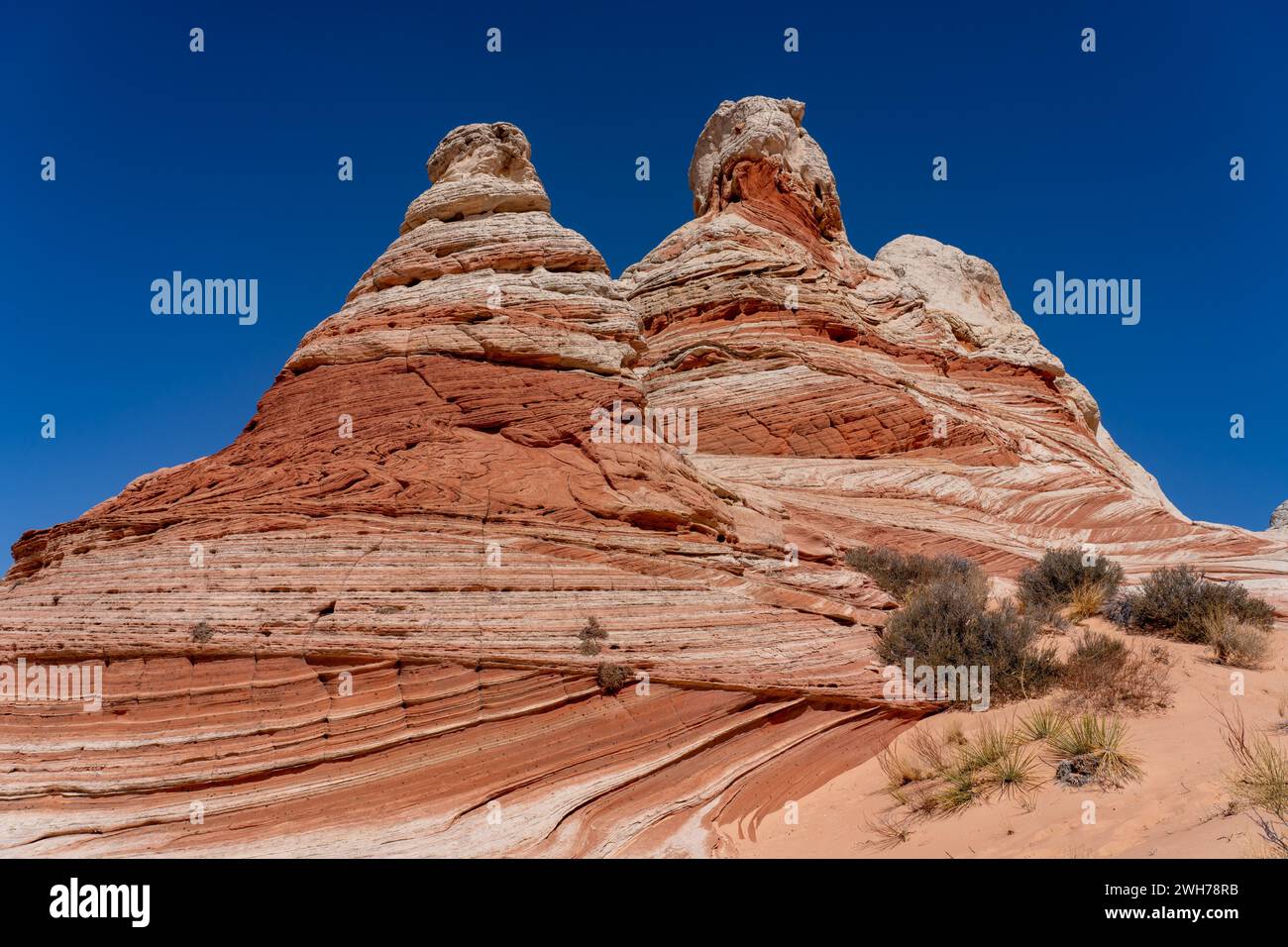 A teepee-shaped sandstone rock formation in the White Pocket Recreation ...