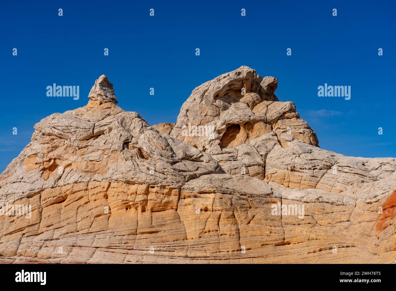 A teepee-shaped sandstone rock formation in the White Pocket Recreation ...