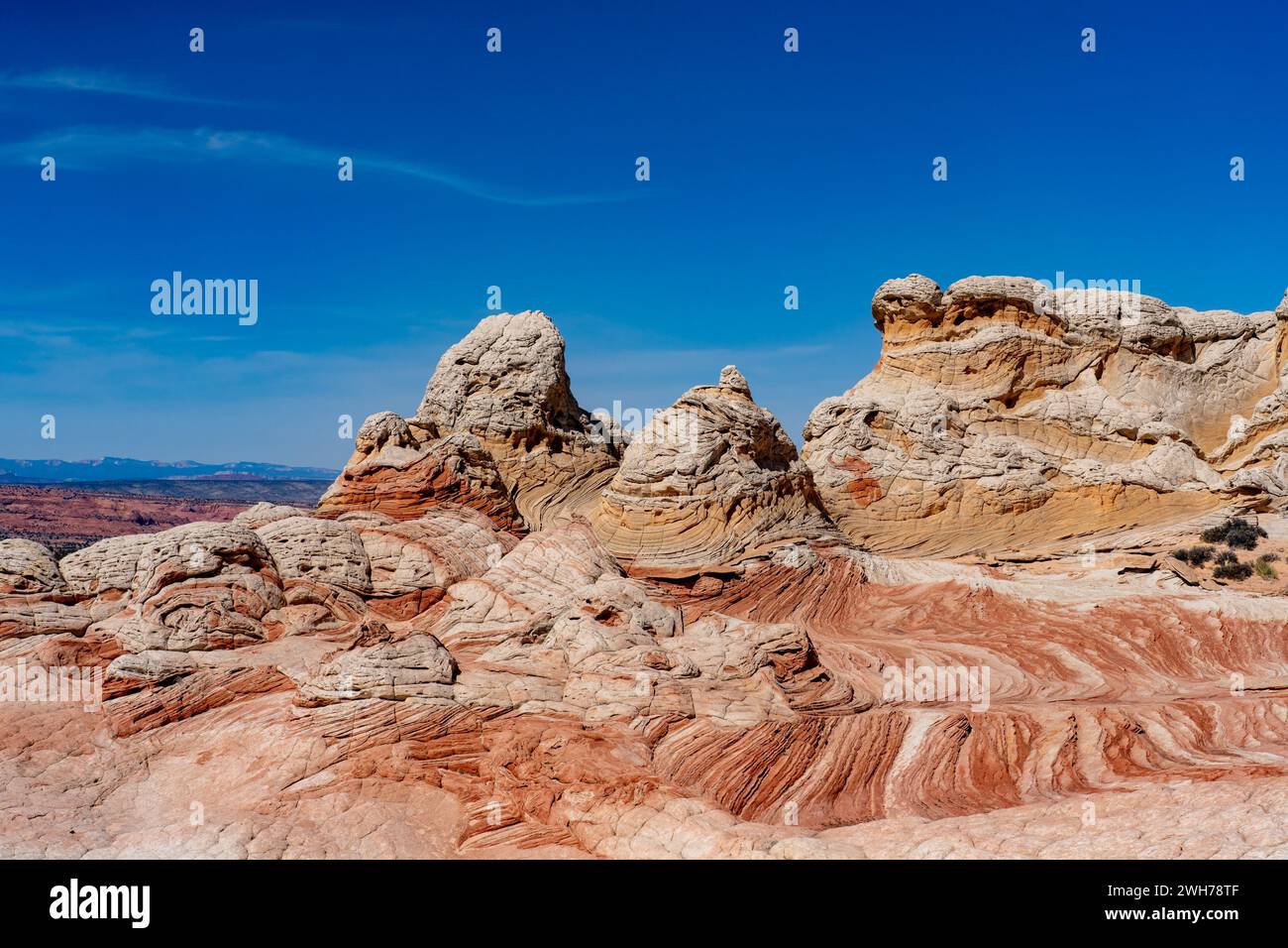 A teepee-shaped sandstone rock formation in the White Pocket Recreation ...