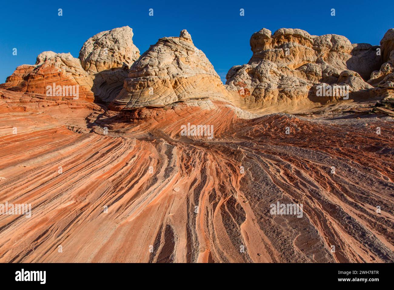 A teepee-shaped sandstone rock formation in the White Pocket Recreation ...