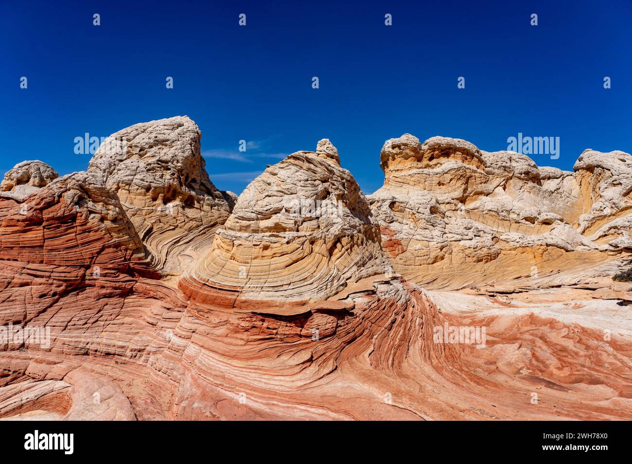 A teepee-shaped sandstone rock formation in the White Pocket Recreation ...