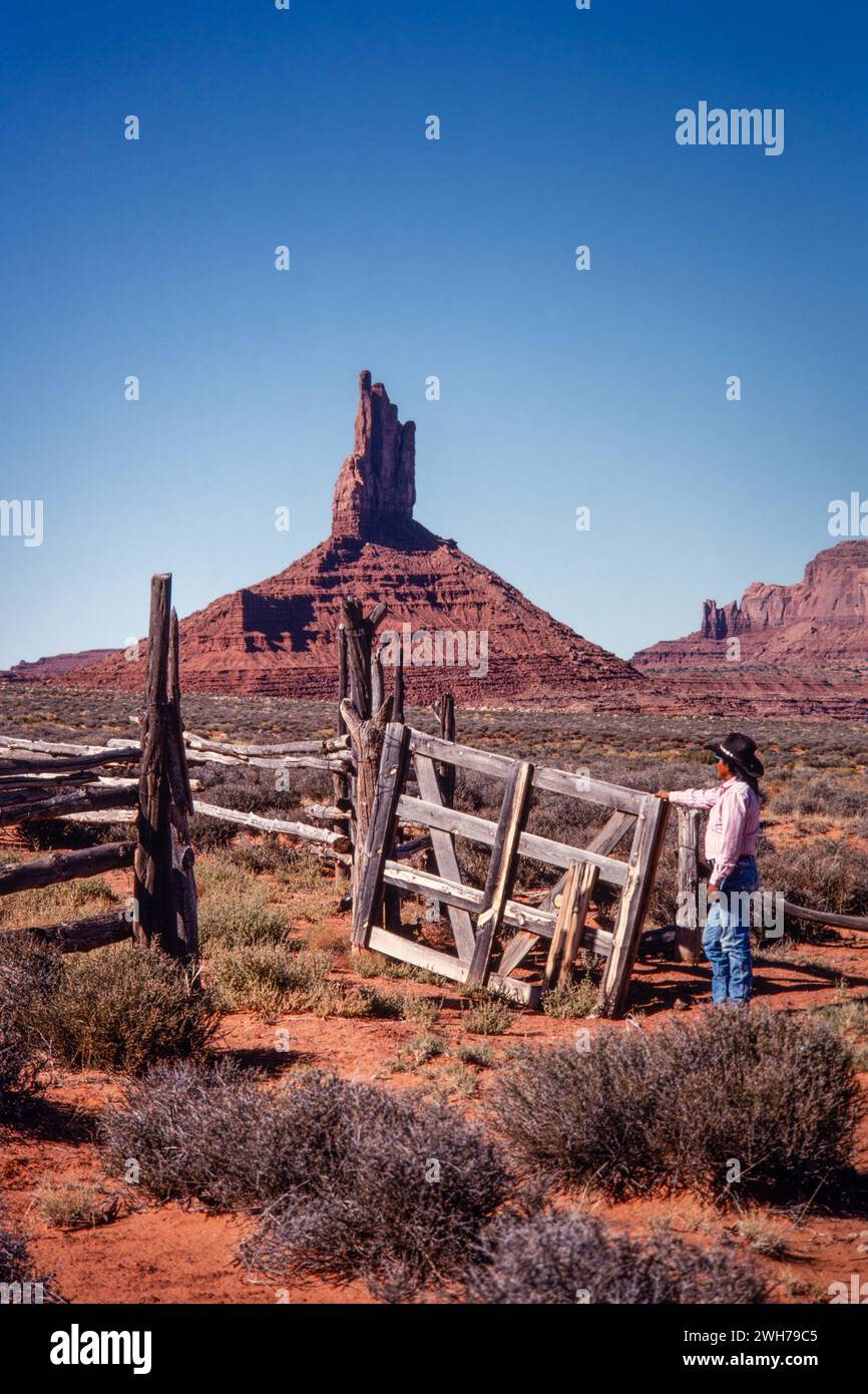 A Navajo cowboy by a corral gate in the Monument Valley Navajo Tribal ...