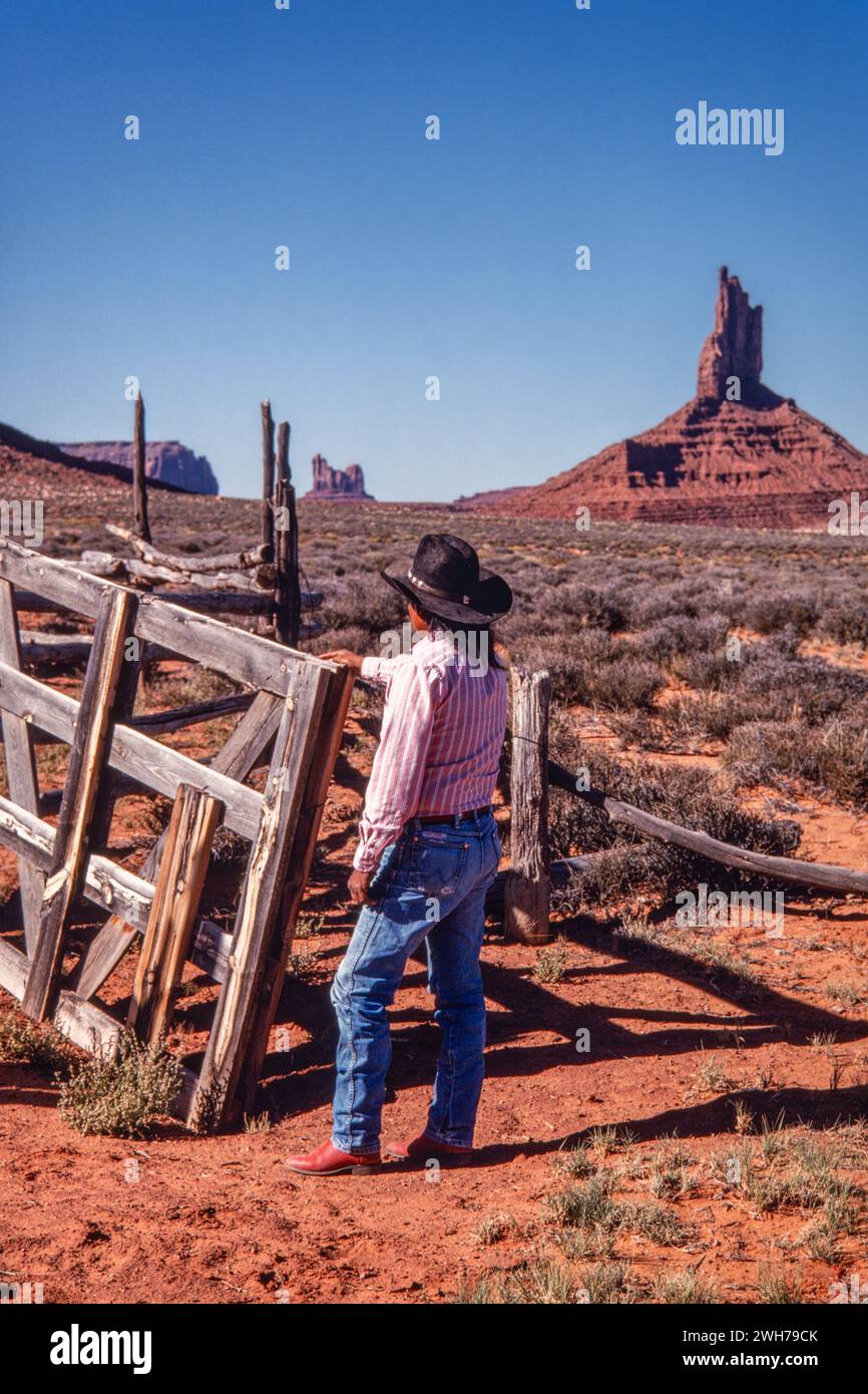 A Navajo cowboy by a corral gate in the Monument Valley Navajo Tribal ...