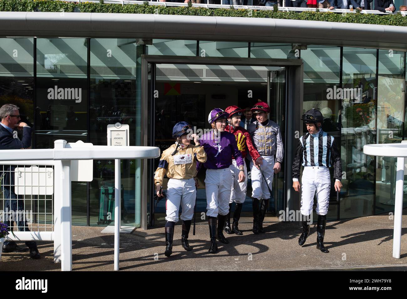 Ascot, Berkshire, UK. 3rd May, 2023. Jockeys head out to race in The ...