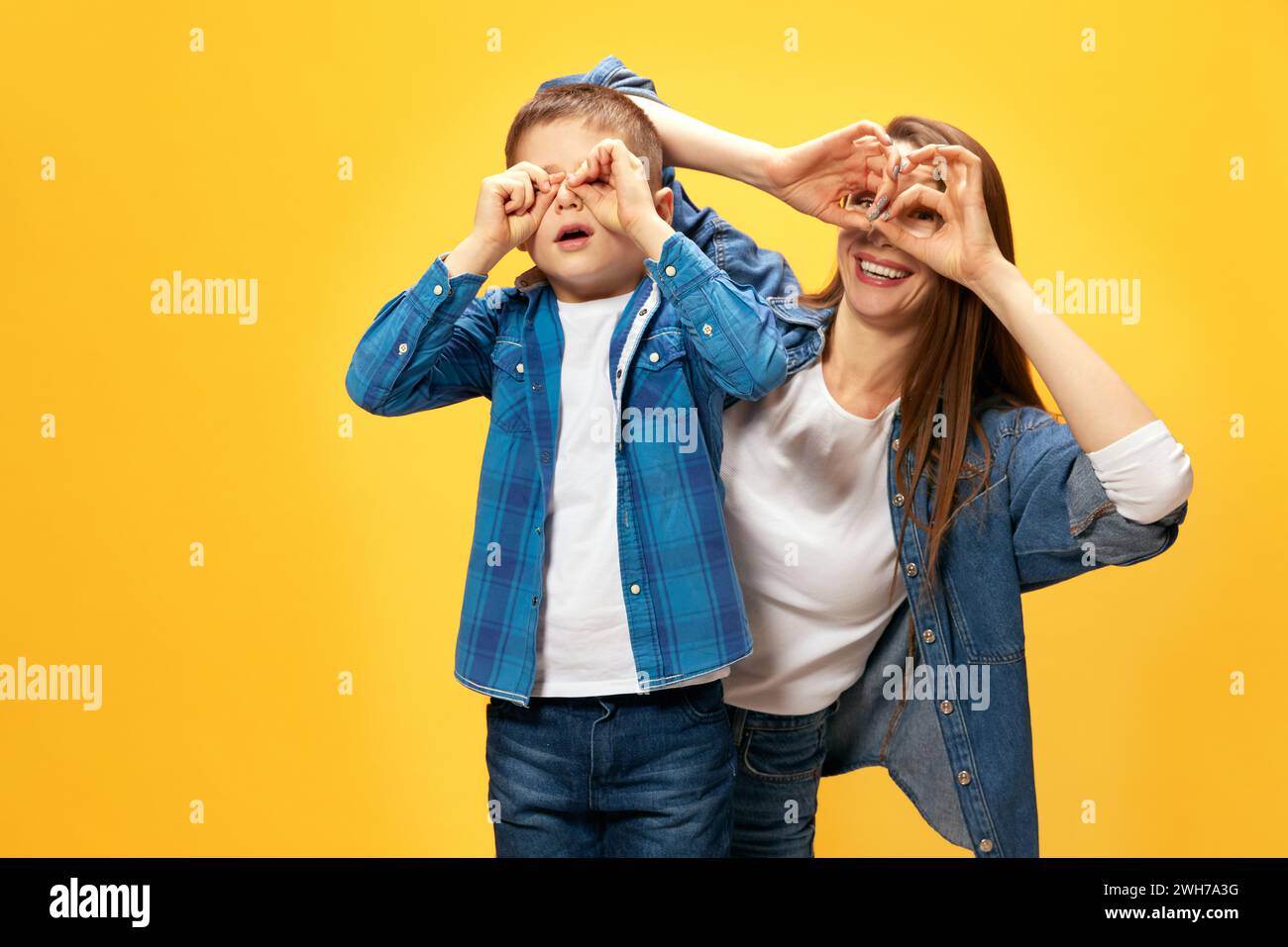 Playful happy family. Mother spending good timer with her little son ...