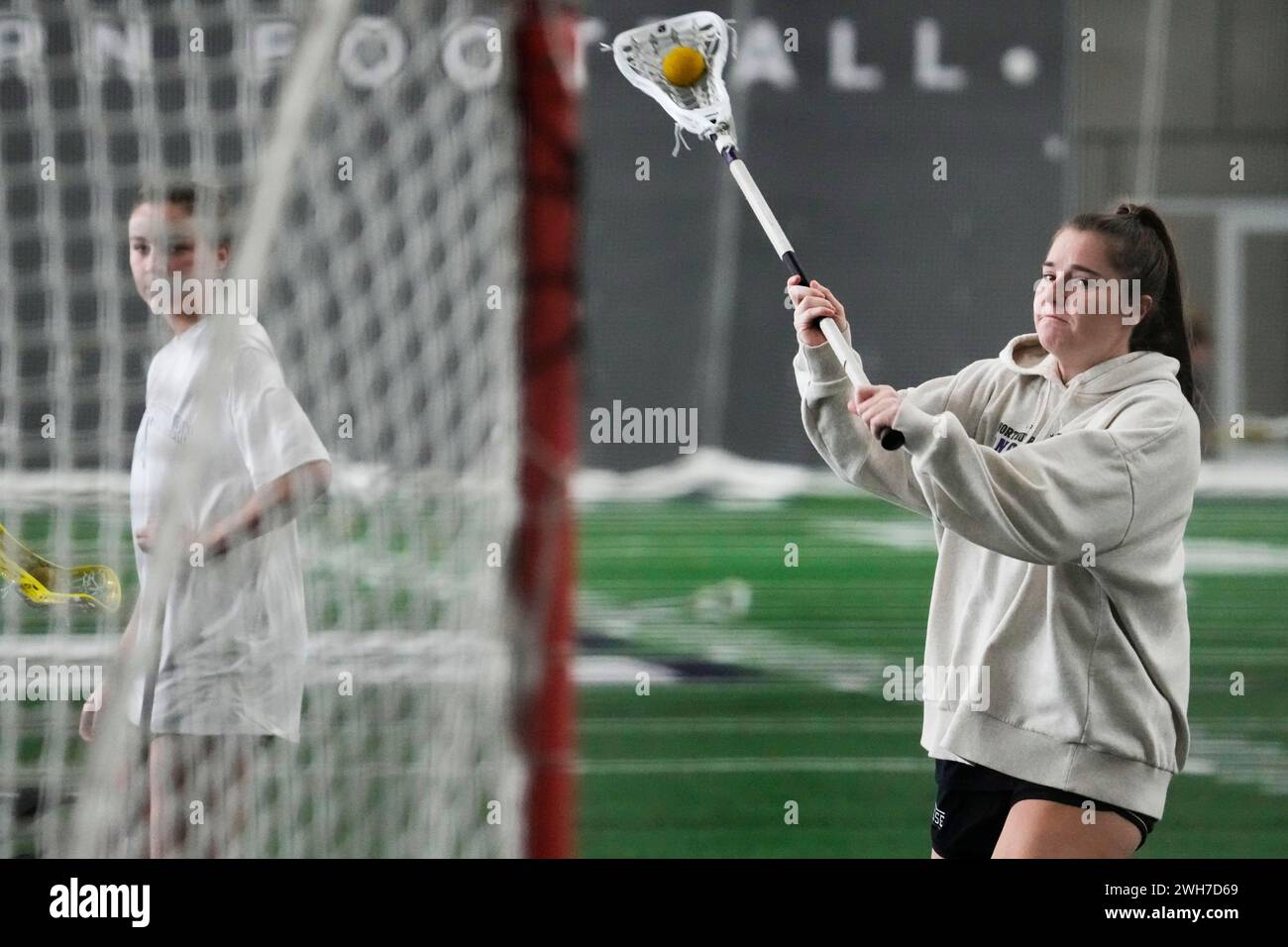 Northwestern lacrosse player Izzy Scane warms up during practice in ...