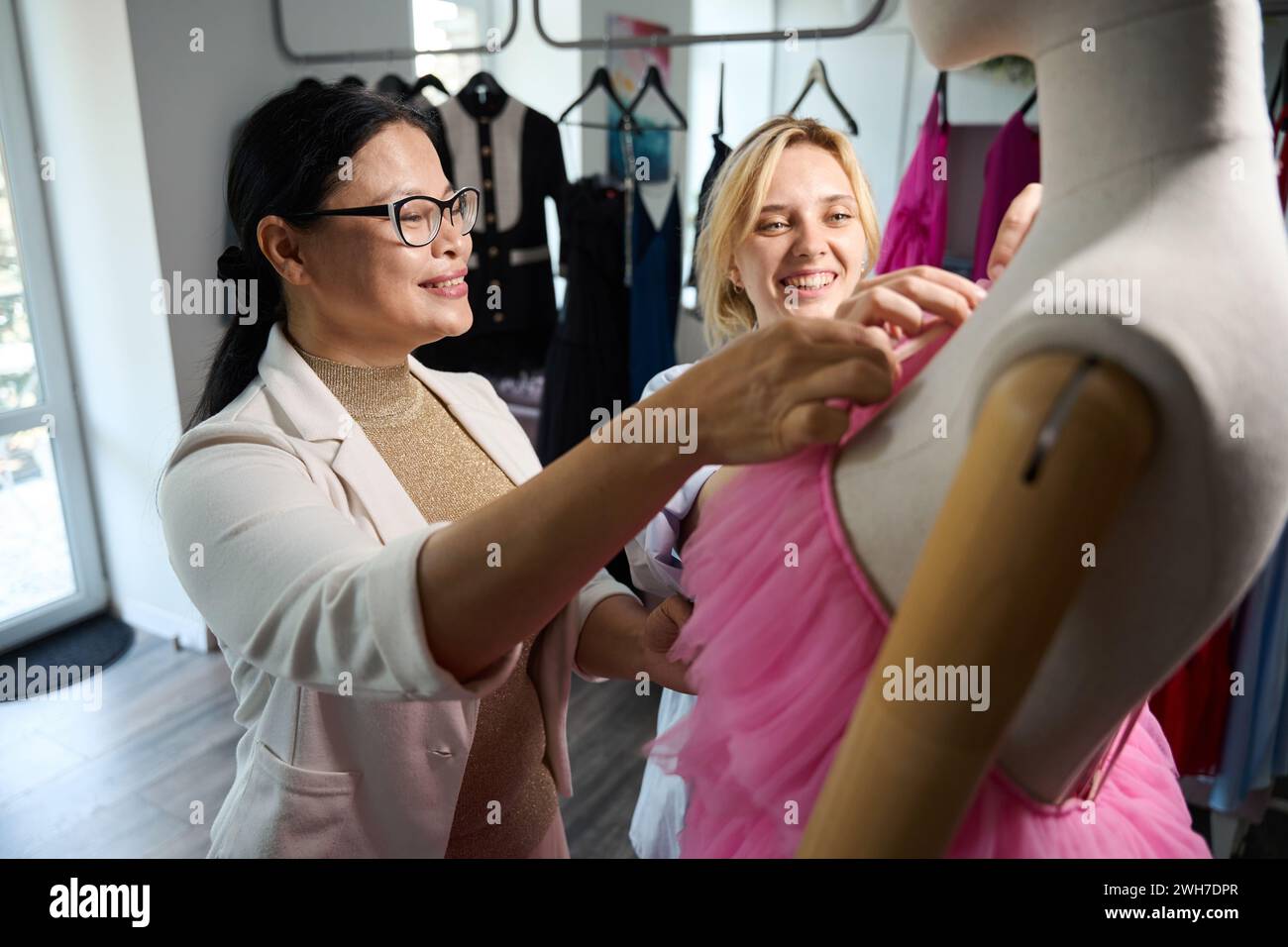 Fashion designer draping fabrics hi-res stock photography and images ...