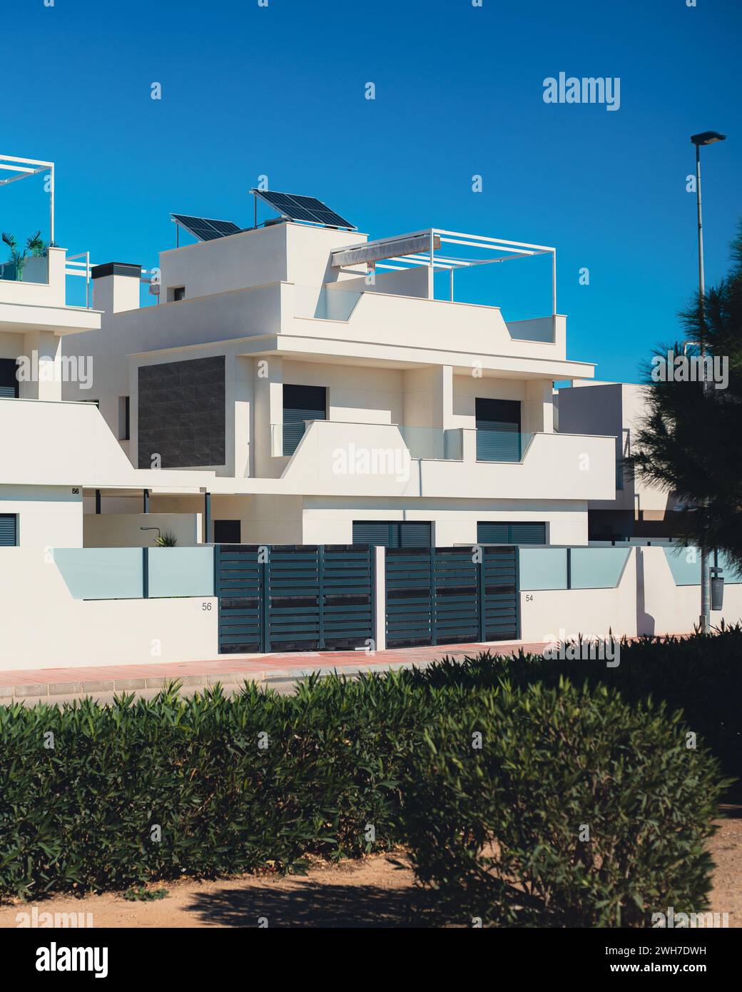 A contemporary beachfront building basking in the sunlight Stock Photo ...