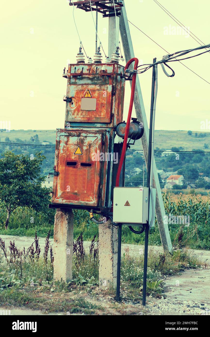 Old electric working transformer in rural areas Stock Photo - Alamy