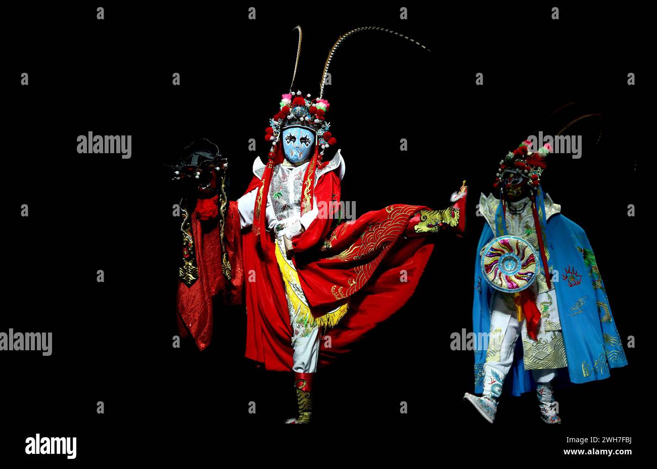 London, Britain. 7th Feb, 2024. Actors perform Sichuan Opera during the Chinese Students and ...