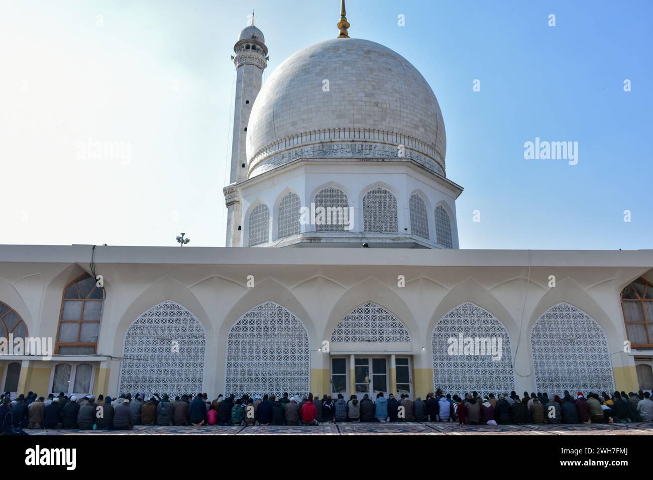 Muslim devotees offer noon prayers on the occasion of Lailat al Miraj ...