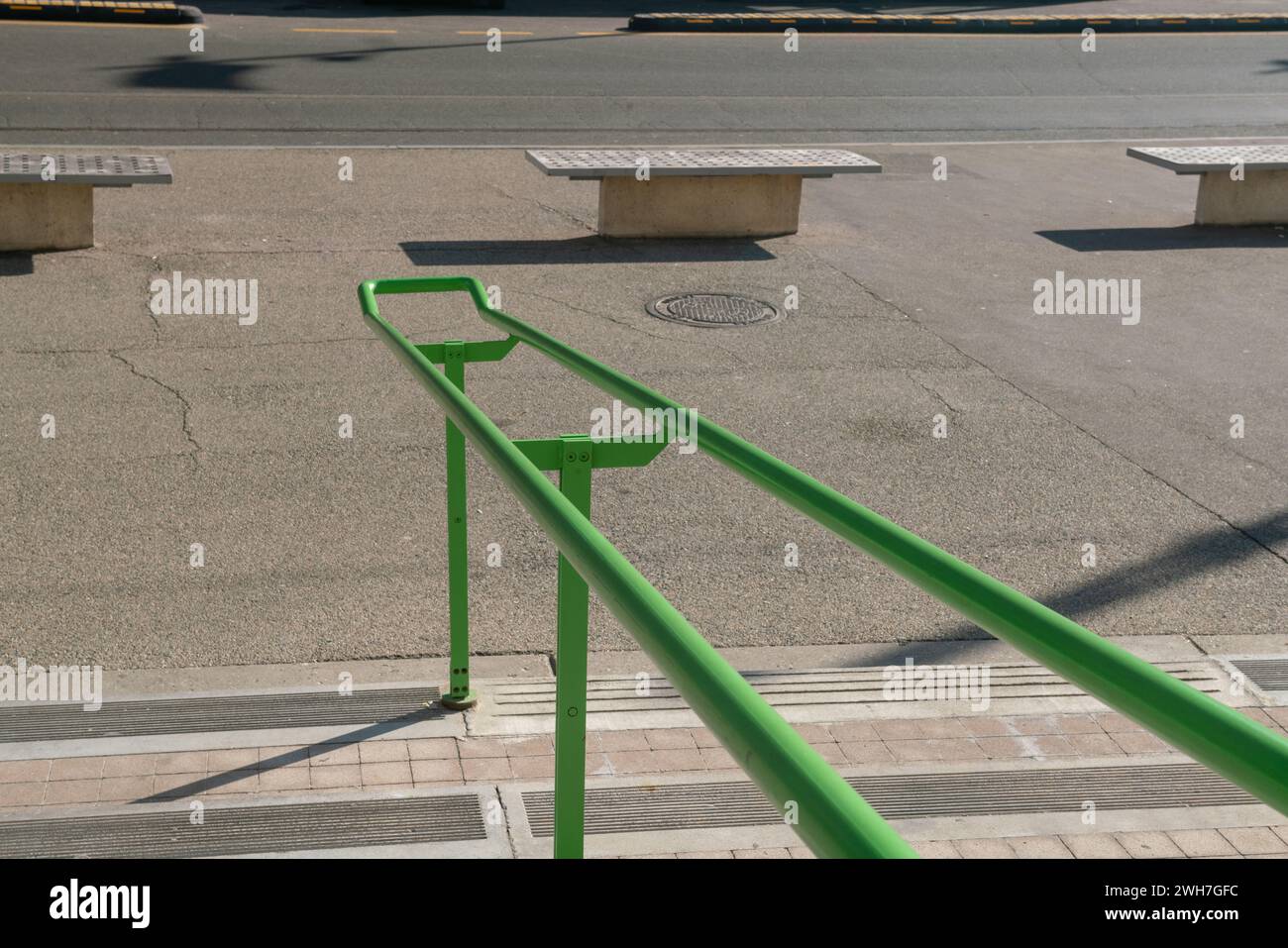 handrail positioned at the entrance of a public building, to support ...