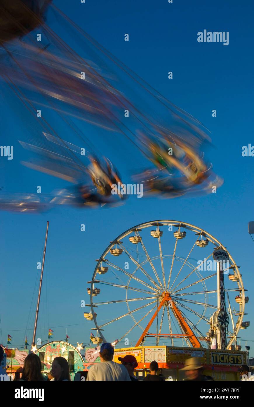 Ferris wheel with Wave Swinger carnival ride, Oregon State Fair, Salem ...