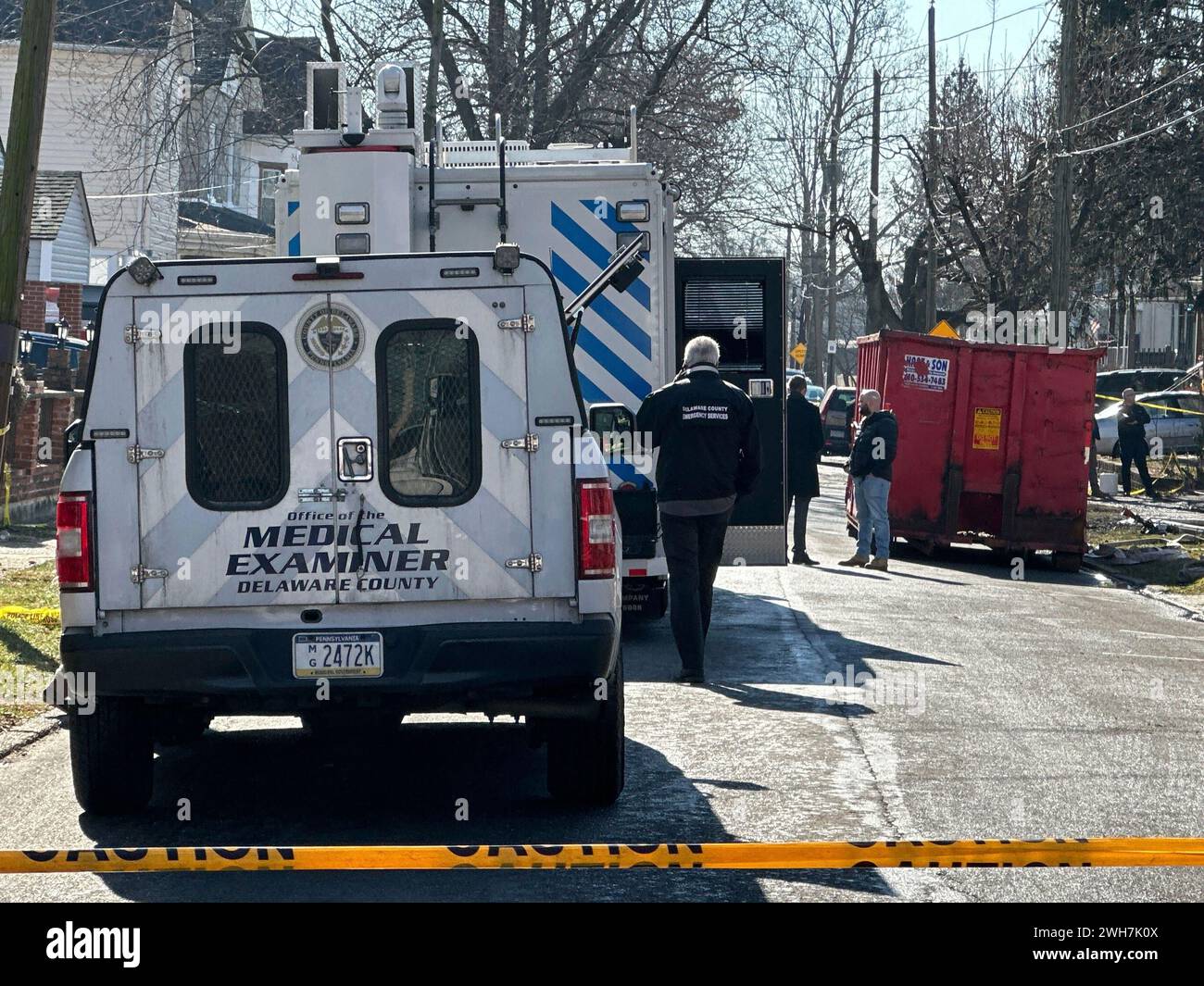 Emergency personnel work at the scene where two police officers were ...