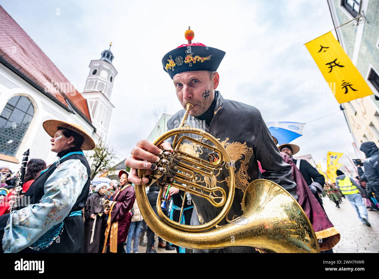 Dietfurt, Germany. 08th Feb, 2024. A musician in a Chinese costume ...
