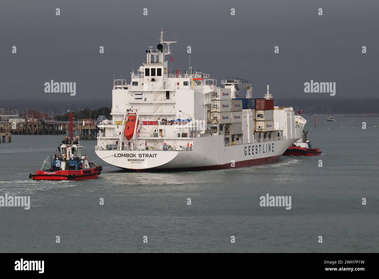 Tugs assist the Liberian registered refrigerated cargo vessel MV LOMBOK ...