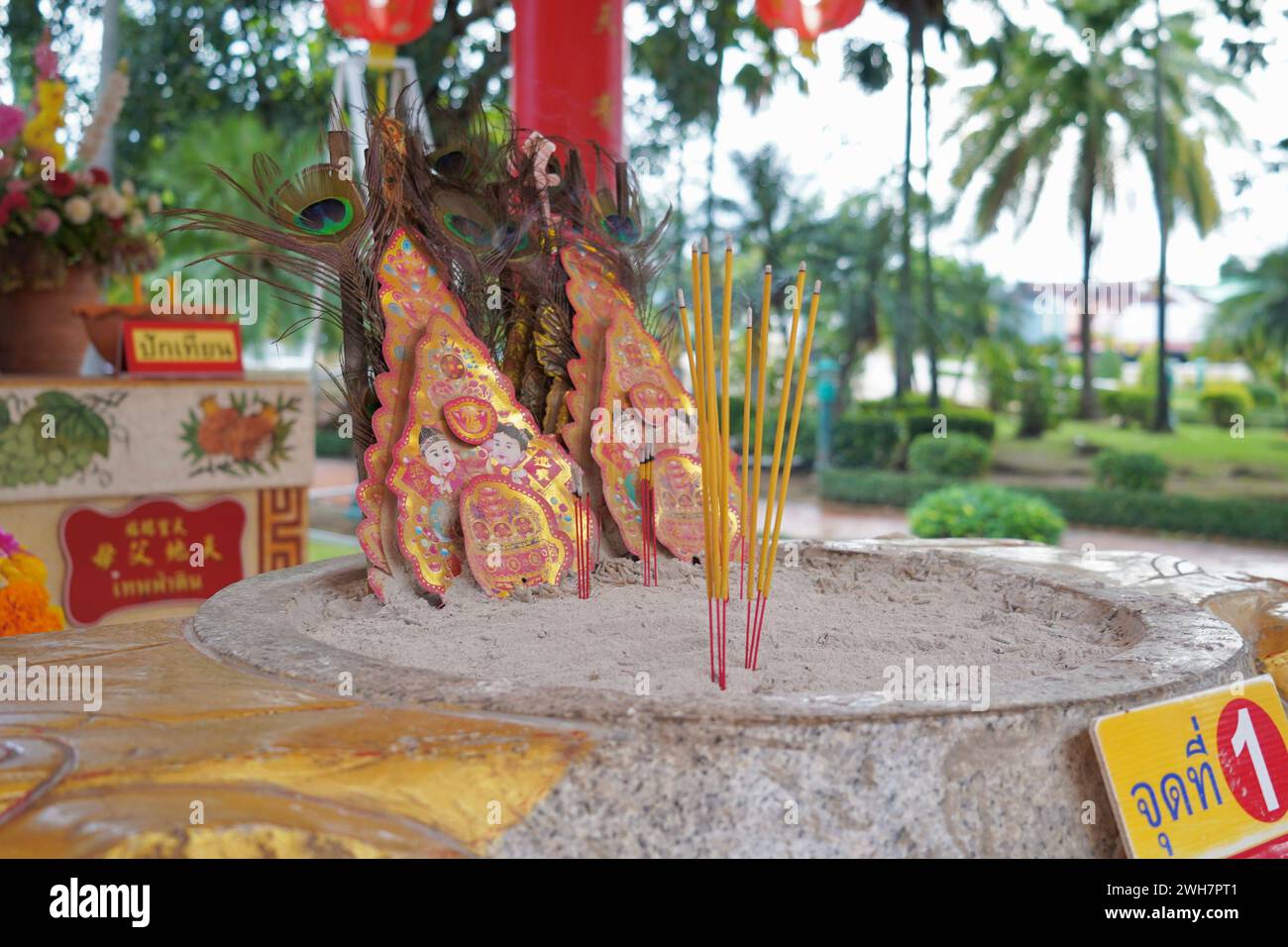 The incense sticks and candle worship the Buddha image statue Stock ...