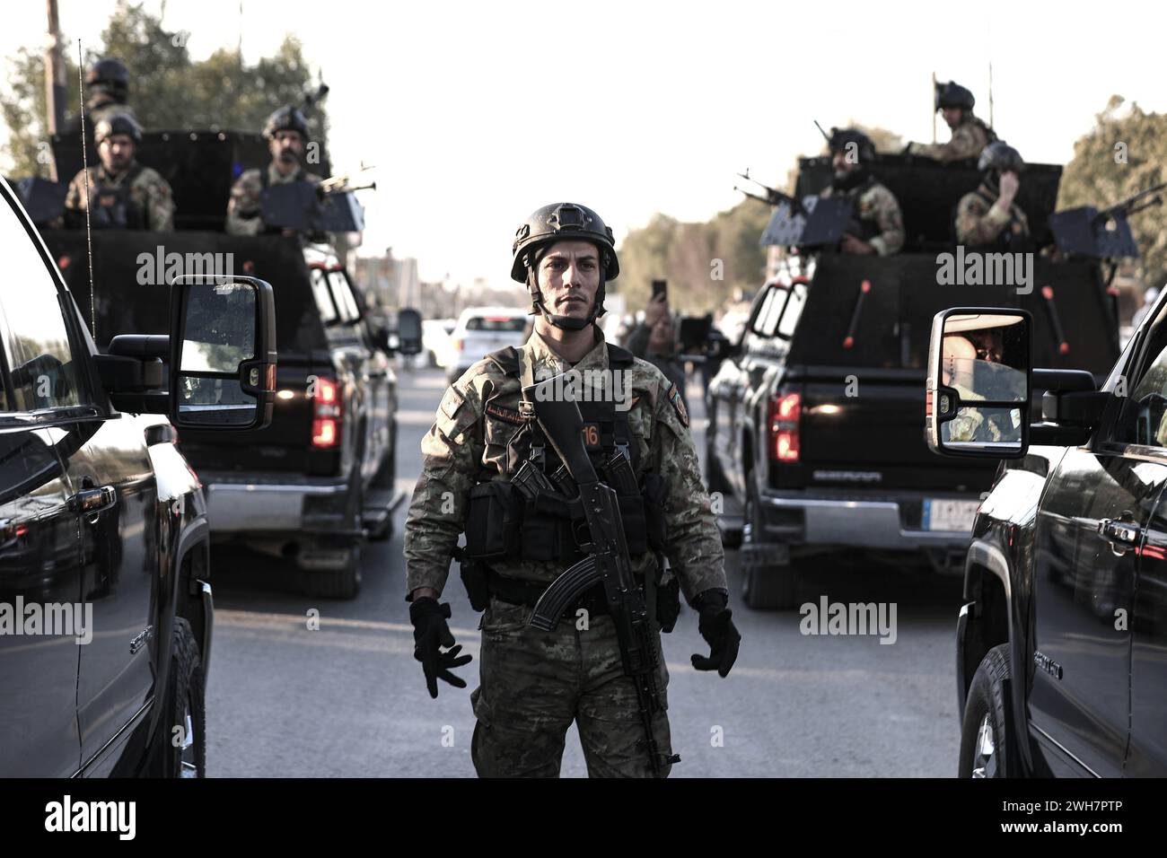 Baghdad, Iraq. 08th Feb, 2024. Iraqi army soldiers secure the funeral ...