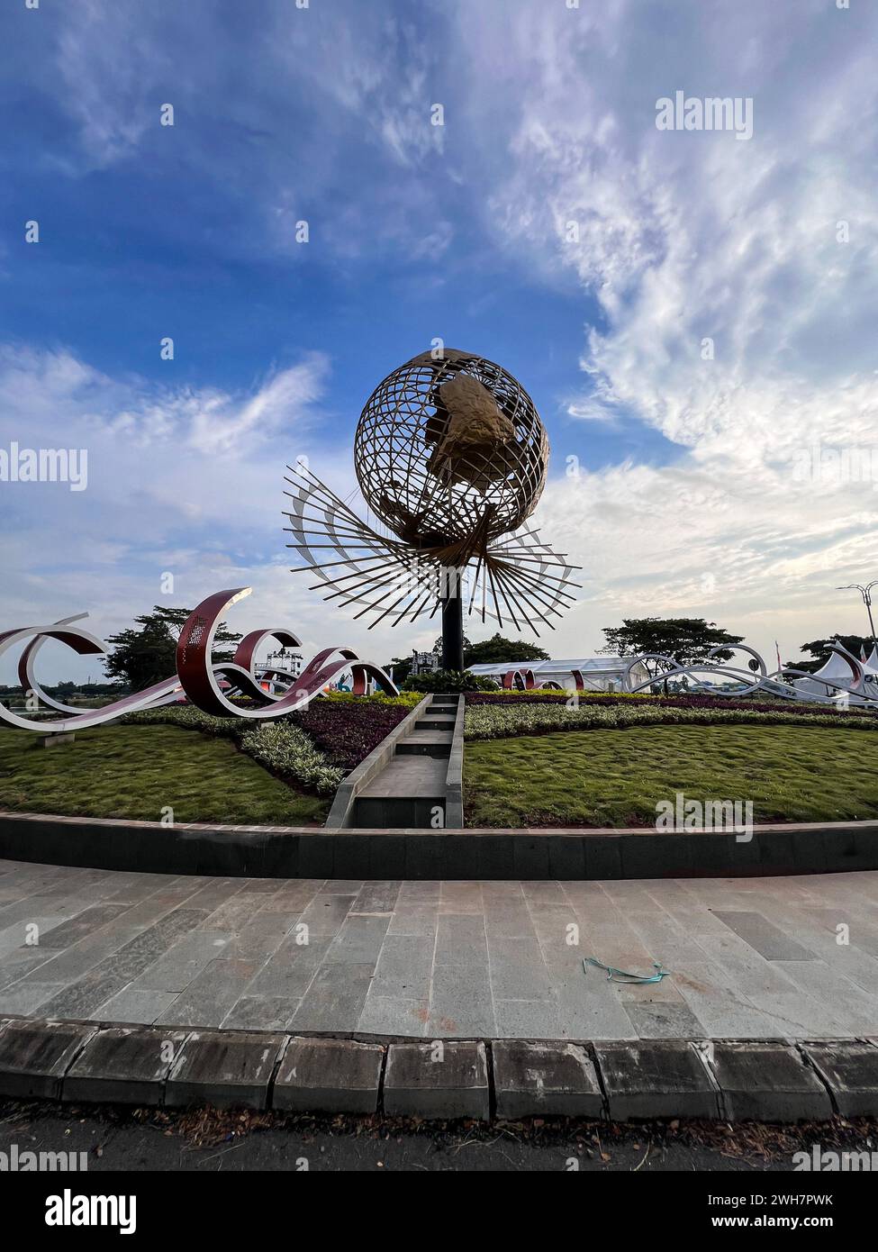View of the housing complex and its iconic steel ball statue, seen from ...