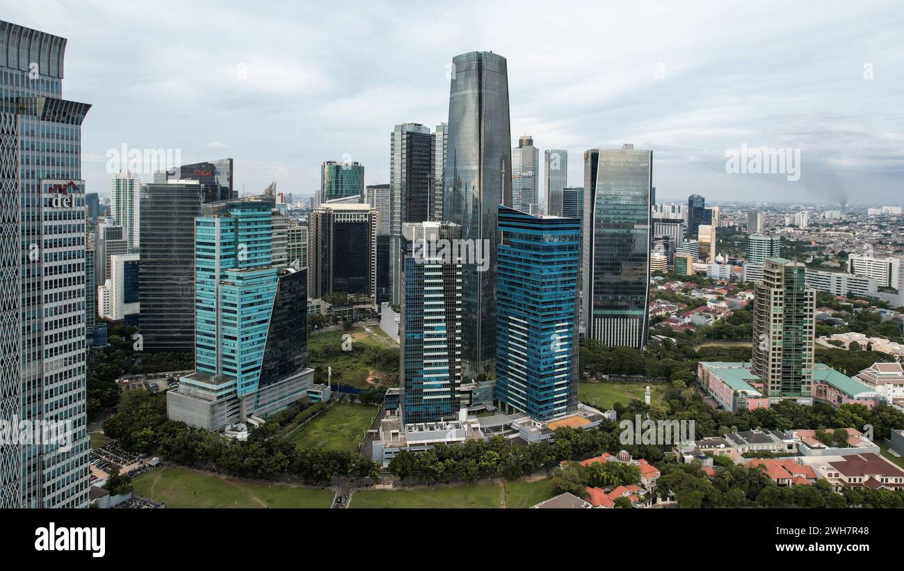 Panoramic cityscape of Indonesia capital city Jakarta at sunset. A rare ...